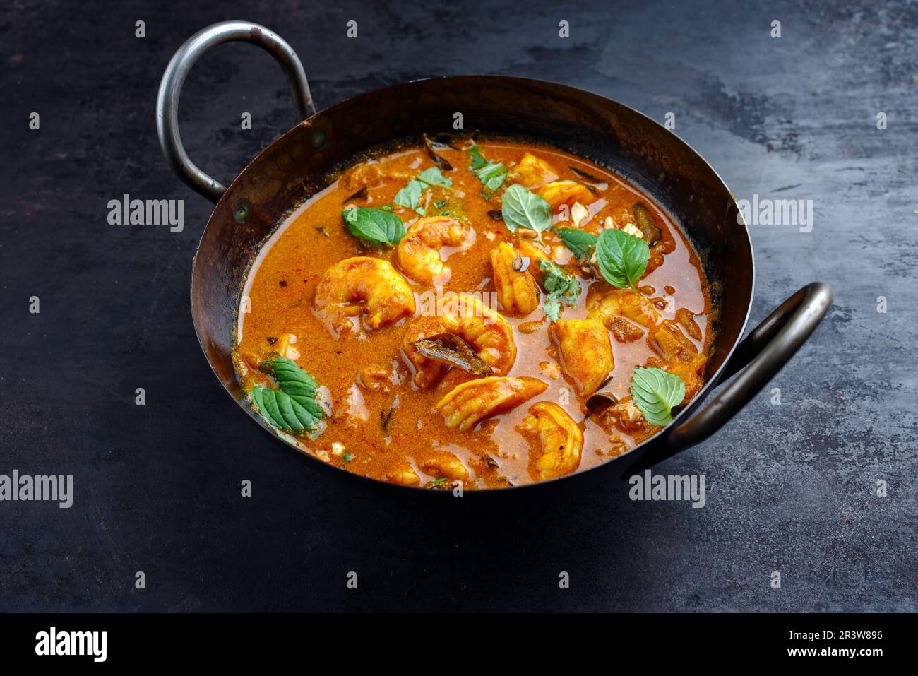Traditional spicy Indian prawn Madras curry Rogan Josh with king prawns ...