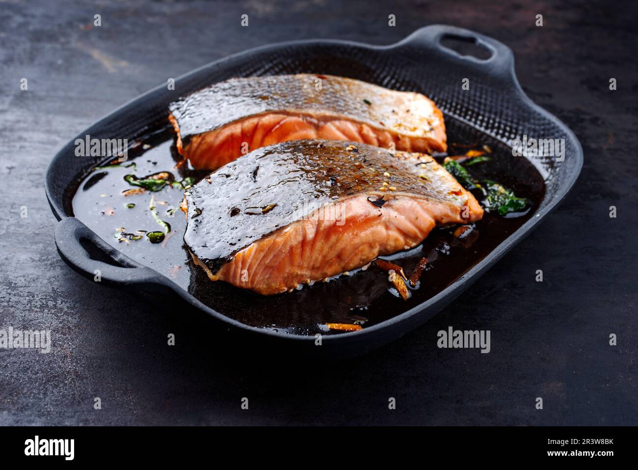 Traditional Japanese salmon fish teriyaki filet with soy souce and ...