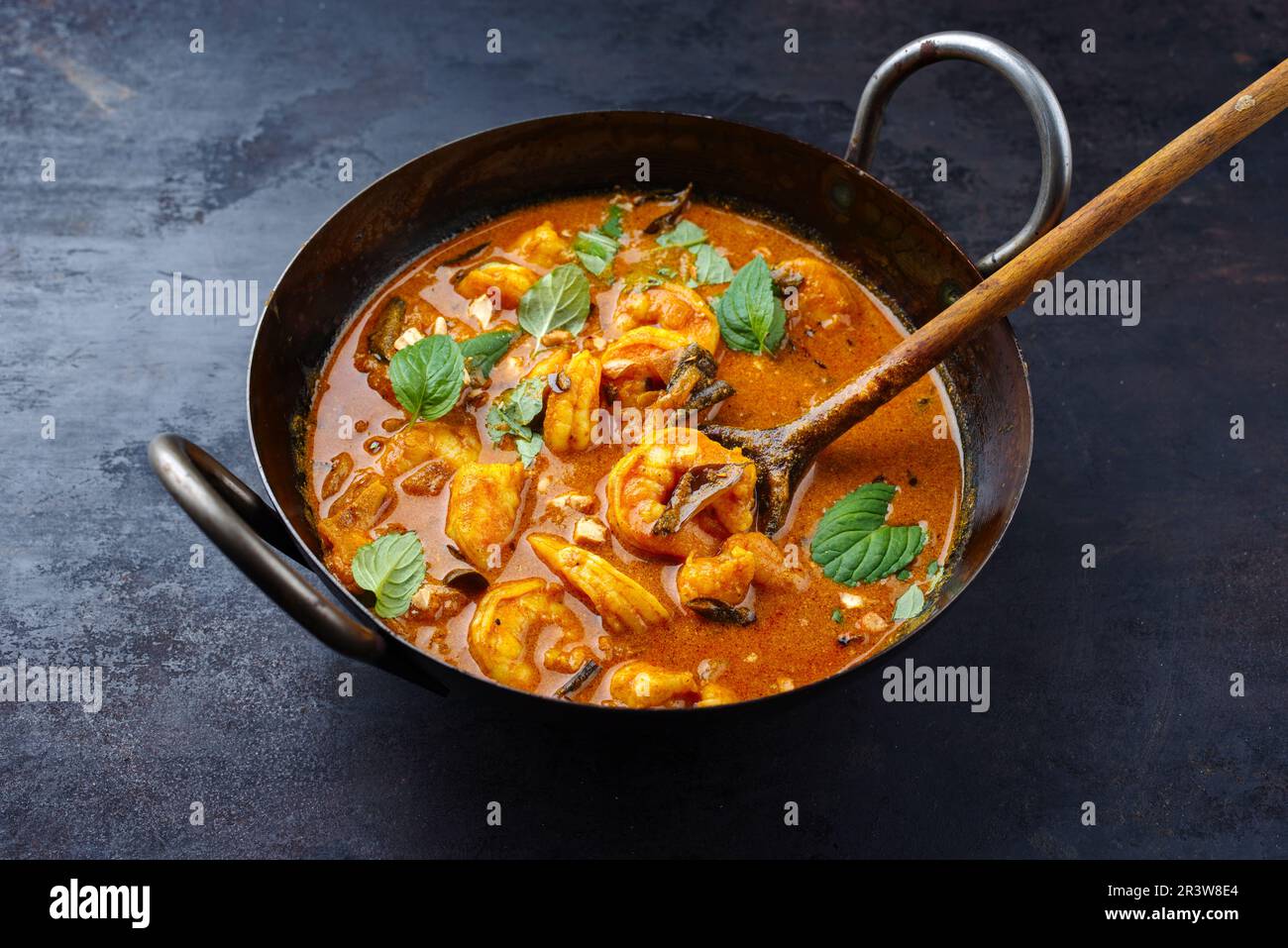 Traditional spicy Indian prawn Madras curry Rogan Josh with king prawns ...