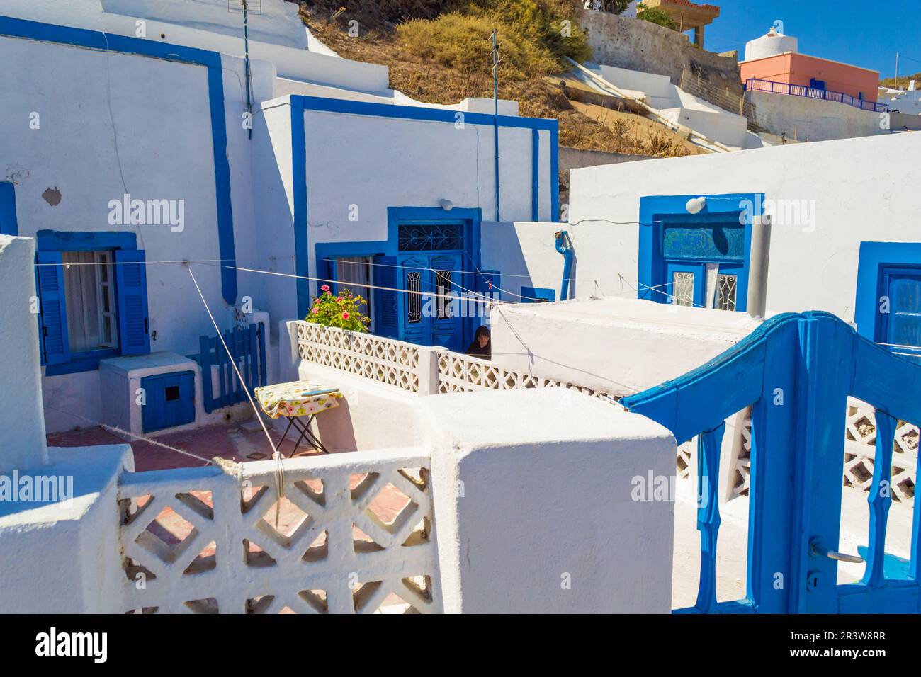 Traditional old cave houses from Thirasia island opposite Santorini ...