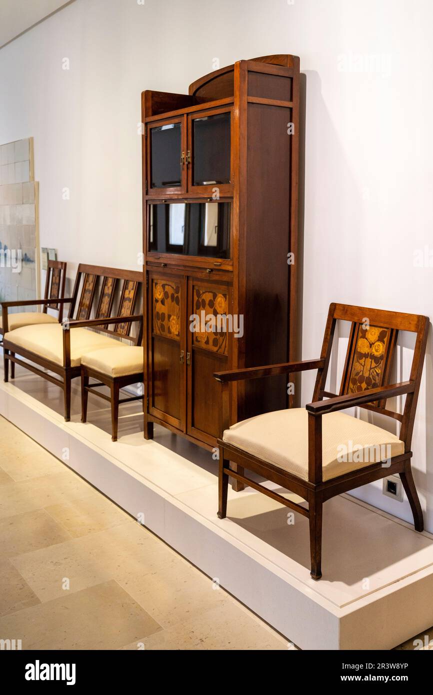 Chairs and showcase Stock Photo - Alamy