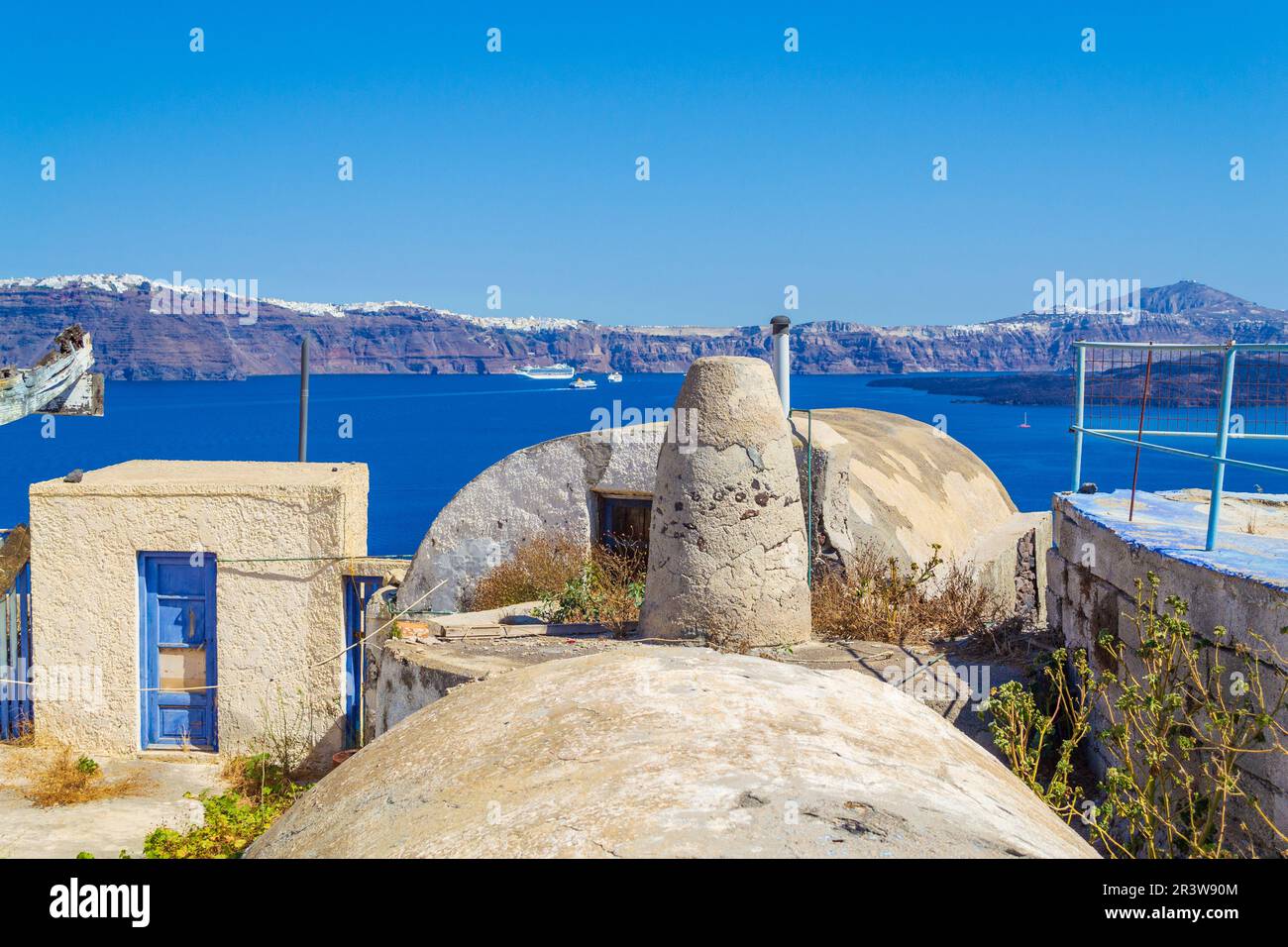 Traditional old cave houses from Thirasia island opposite Santorini ...