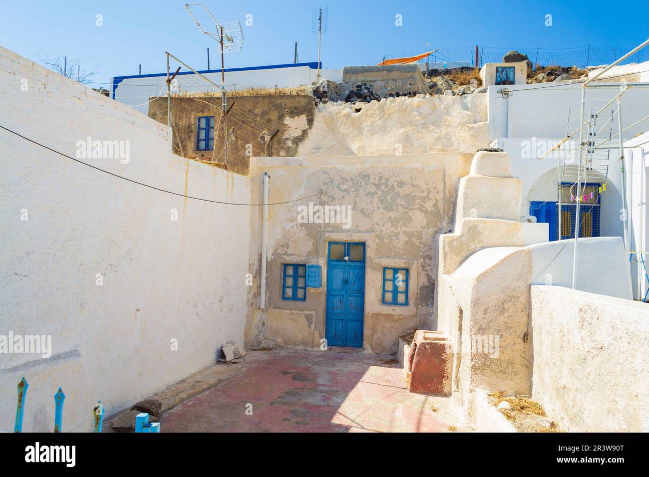 Traditional old cave houses from Thirasia island opposite Santorini ...