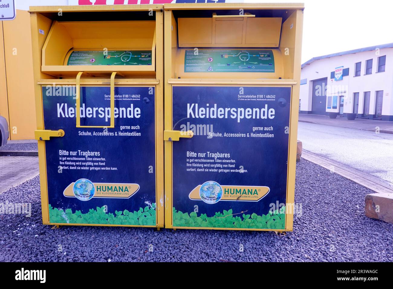 Symbolic image collection container for used clothing of Humana GmbH ...