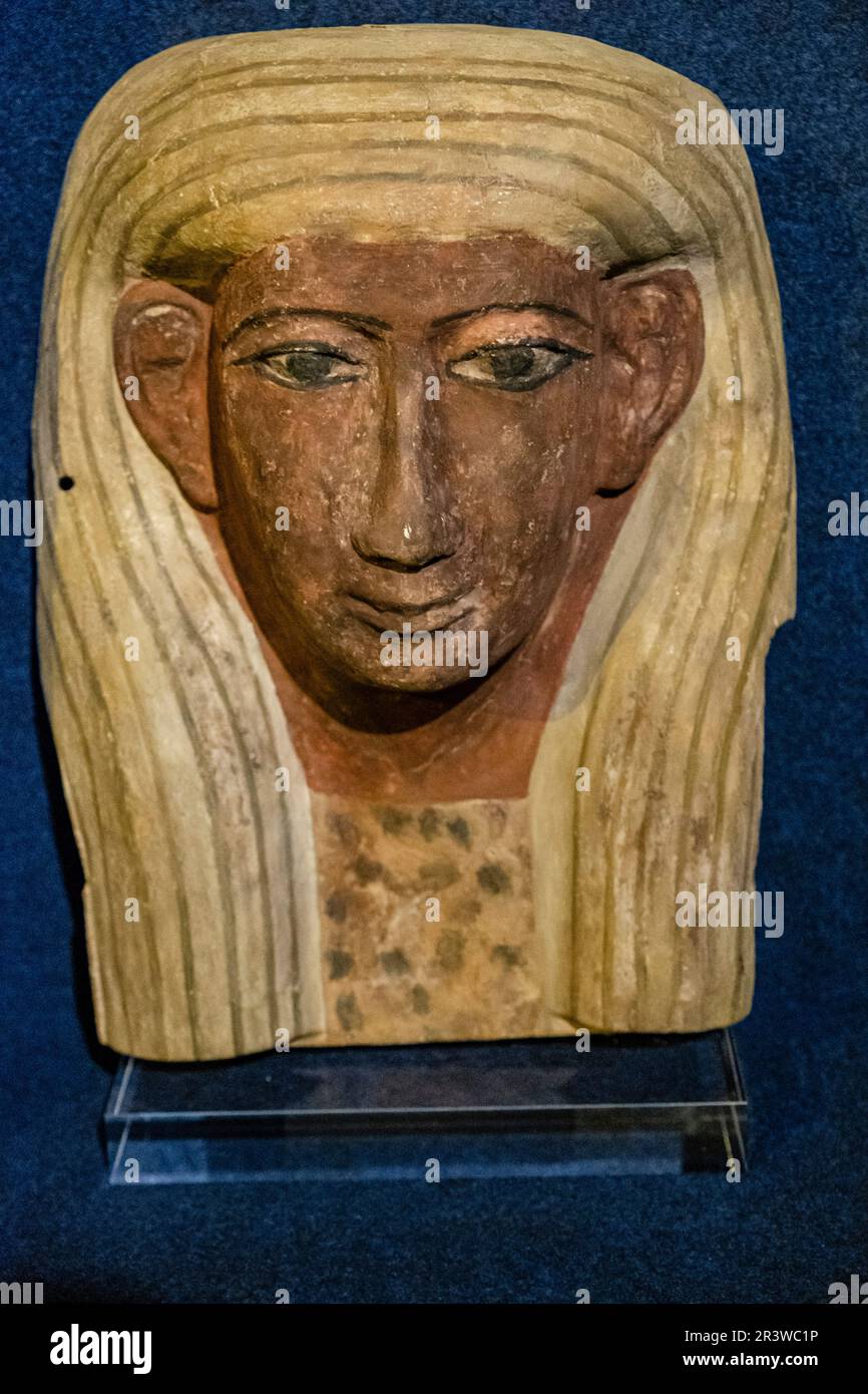 Egyptian anthropomorphic coffin face Stock Photo - Alamy