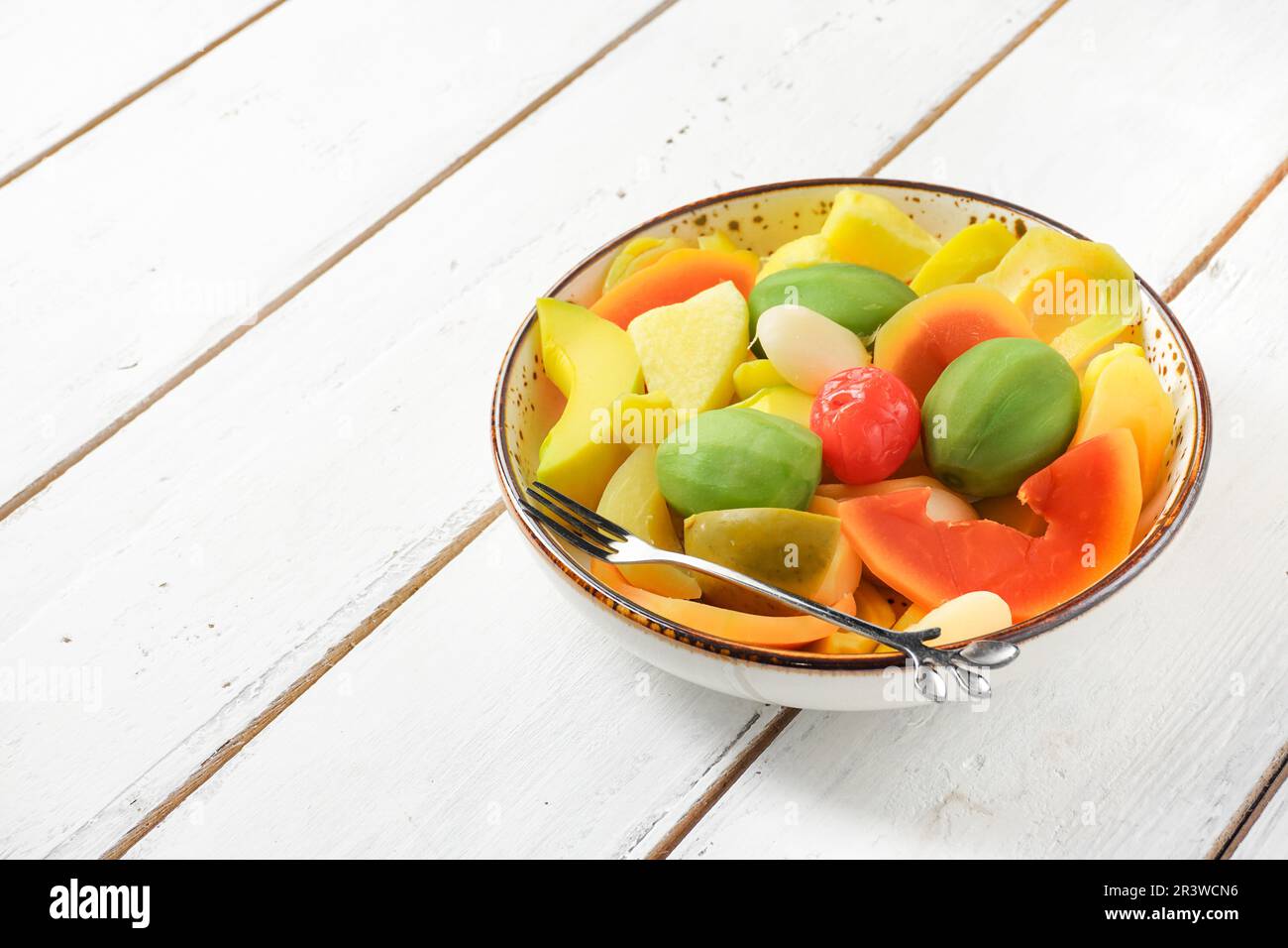 Assorted color fruit pickles, sweet and sour. Malaysian named Jeruk ...