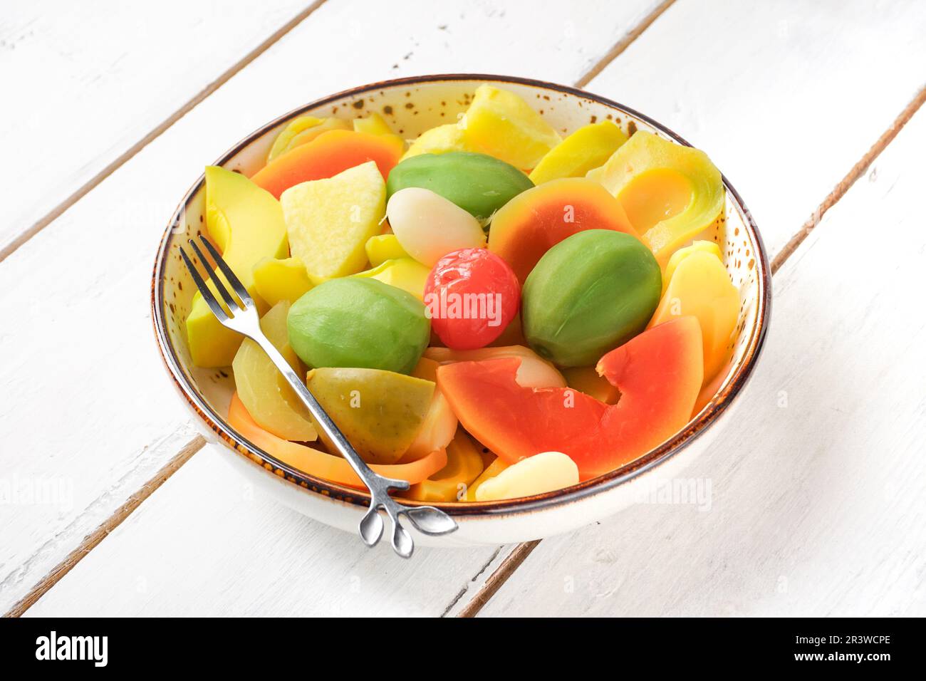 Assorted color fruit pickles, sweet and sour. Malaysian named Jeruk ...