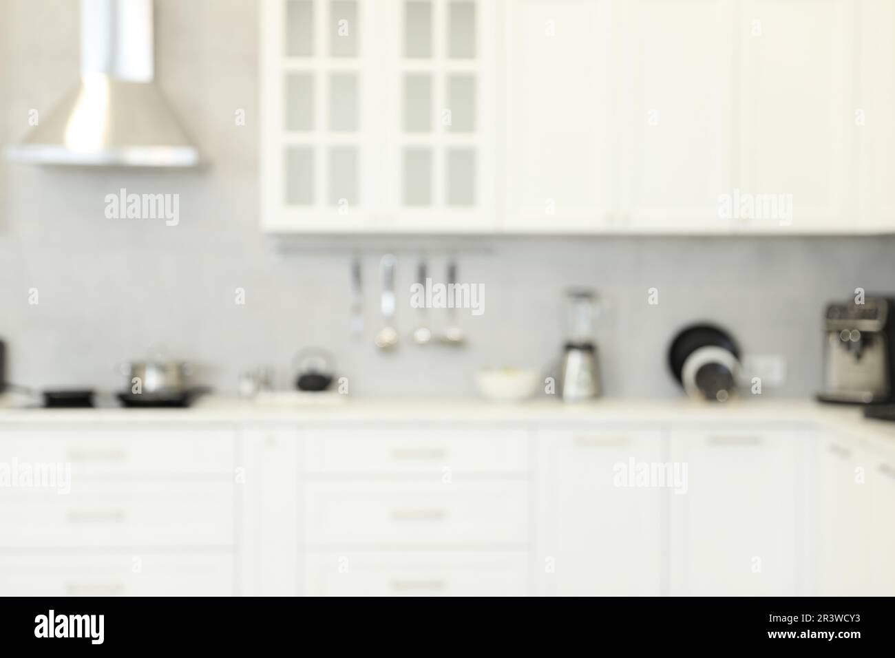 Blurred view of modern kitchen. Interior design Stock Photo - Alamy