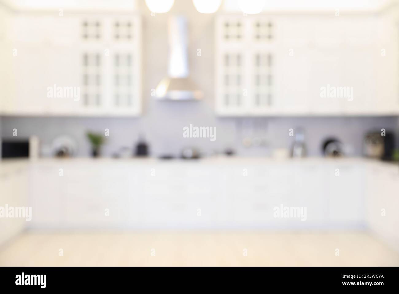Blurred view of modern kitchen. Interior design Stock Photo - Alamy
