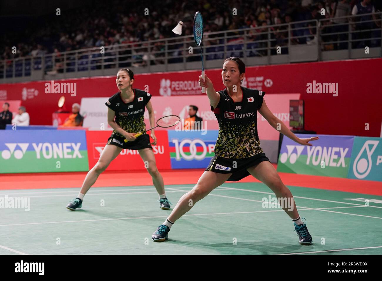 Japan's Nami Matsuyama, front, and Chiharu Shida play during their women's doubles badminton ...