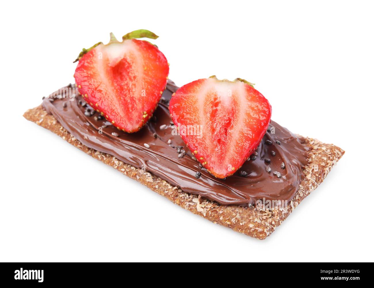 Fresh crunchy rye crispbread with chocolate spread, strawberry and chia ...