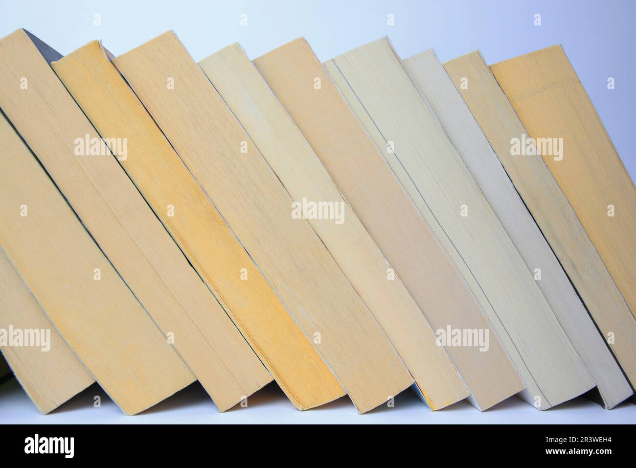 Collection of different books on light background Stock Photo - Alamy