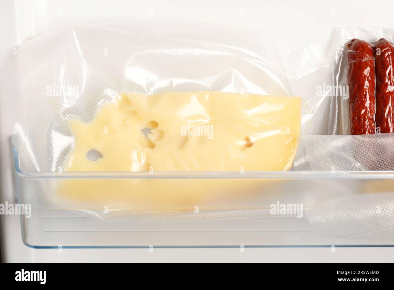 Vacuum packs cheese hi-res stock photography and images - Alamy