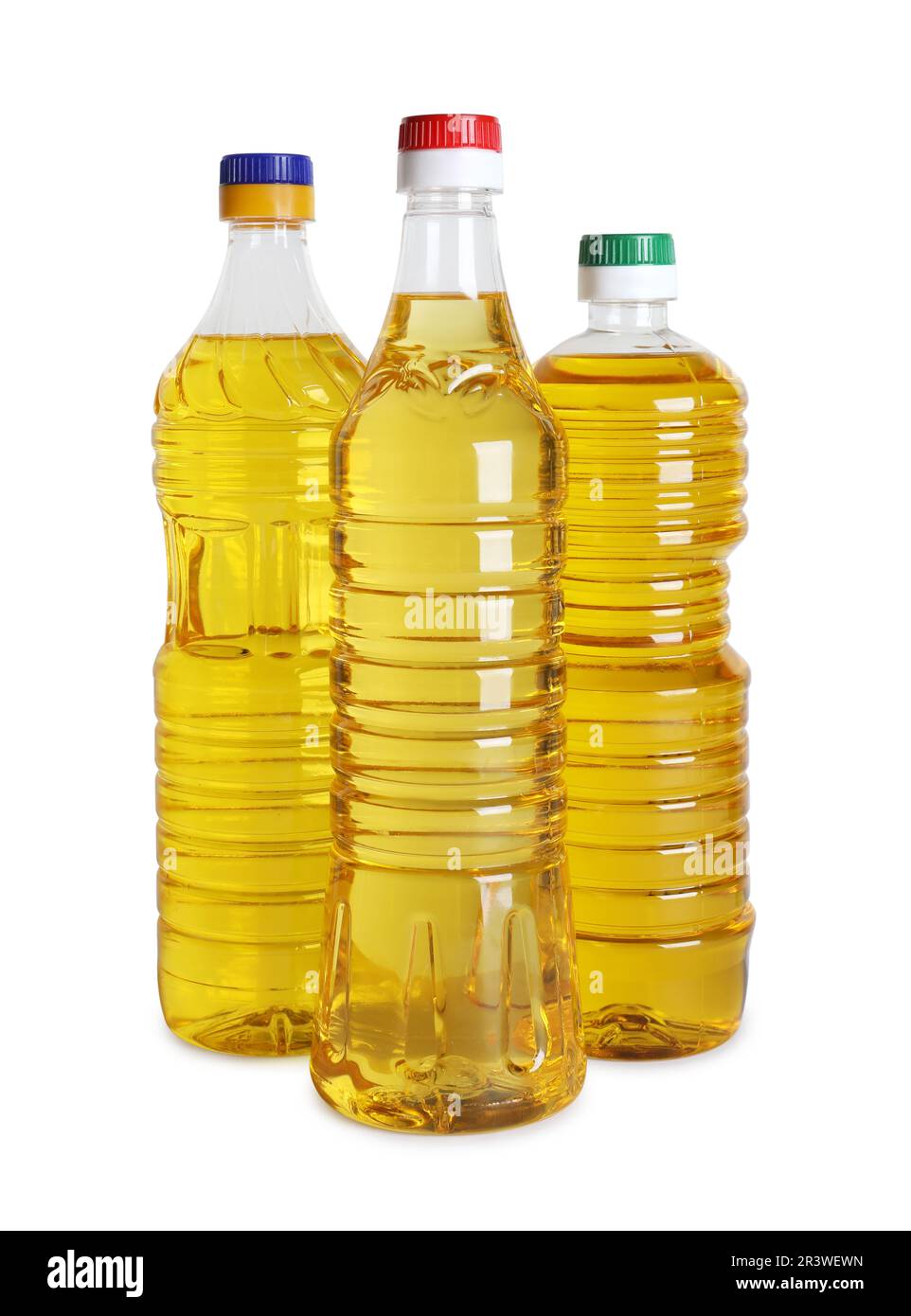 Bottles of cooking oil on white background Stock Photo - Alamy