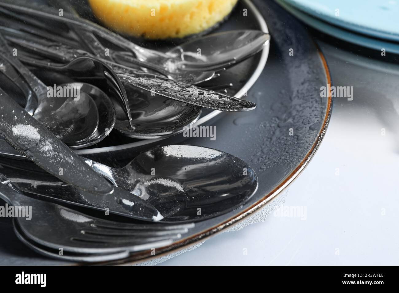 Dishwashing liquid clean plates hi-res stock photography and images - Alamy