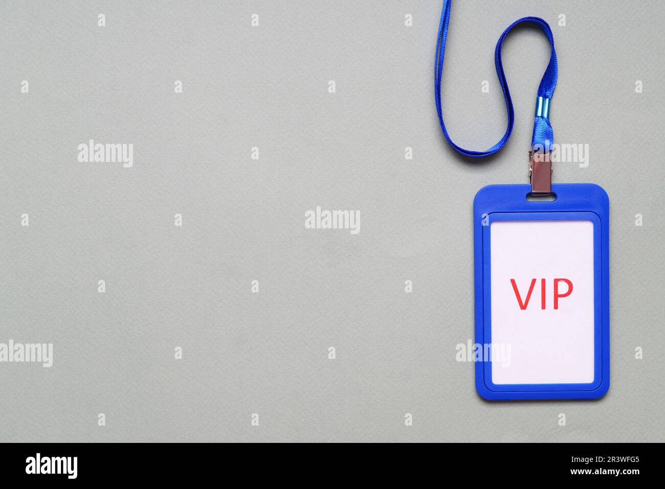 Plastic vip badge on light gray background, top view. Space for text ...