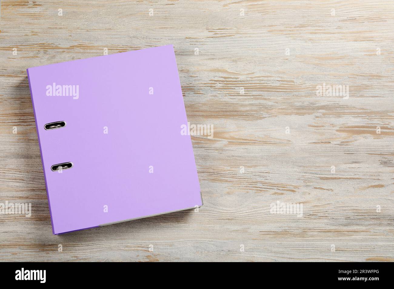 Lilac office folder on wooden table, top view Stock Photo - Alamy