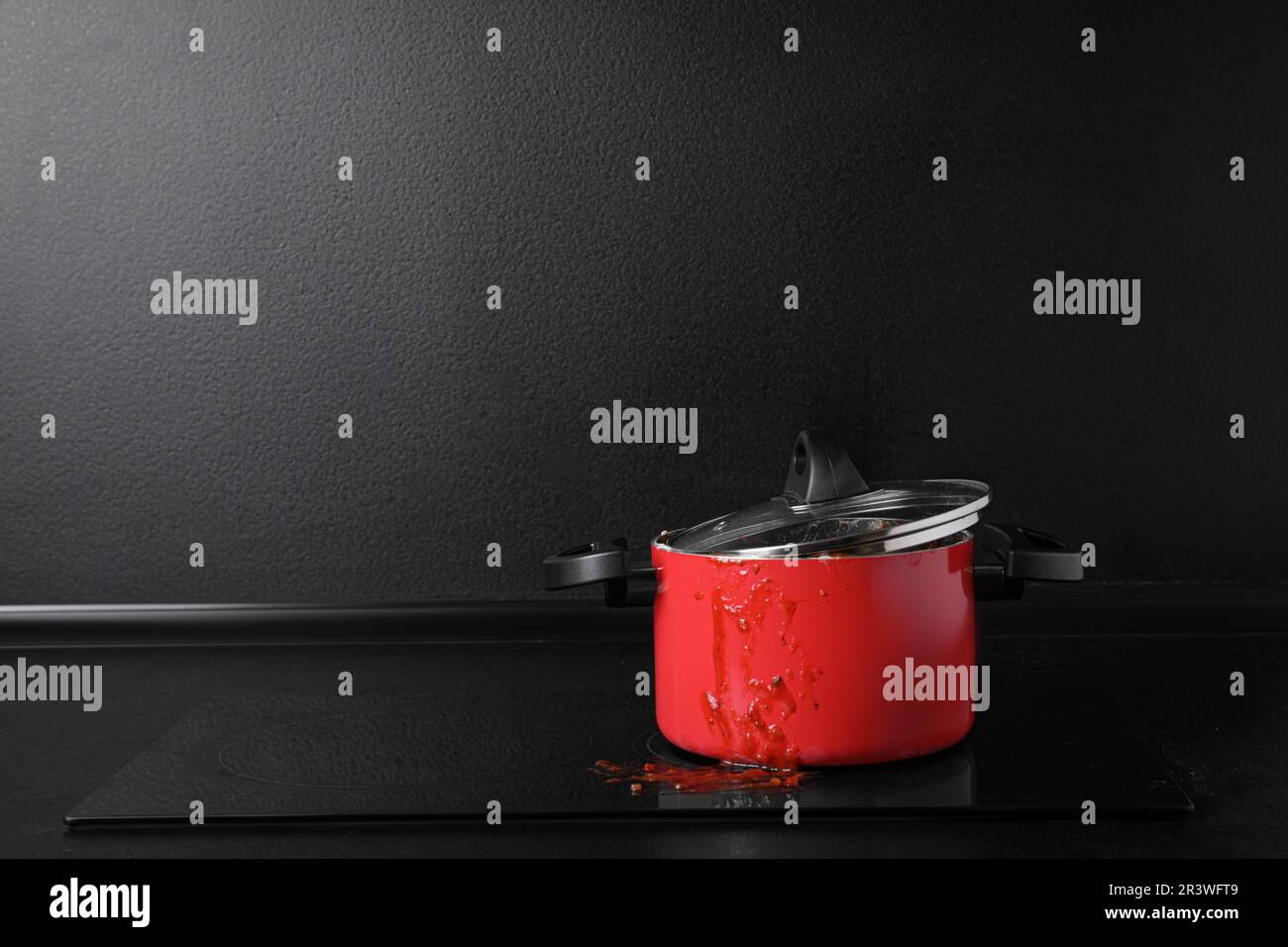 Dirty pot with lid on cooktop in kitchen, space for text Stock Photo ...