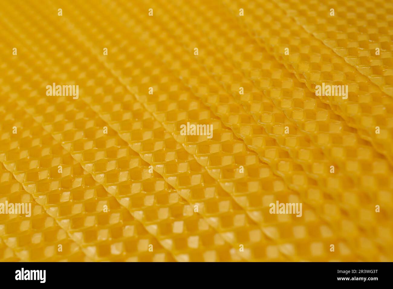 Natural organic beeswax sheet as background, closeup Stock Photo - Alamy