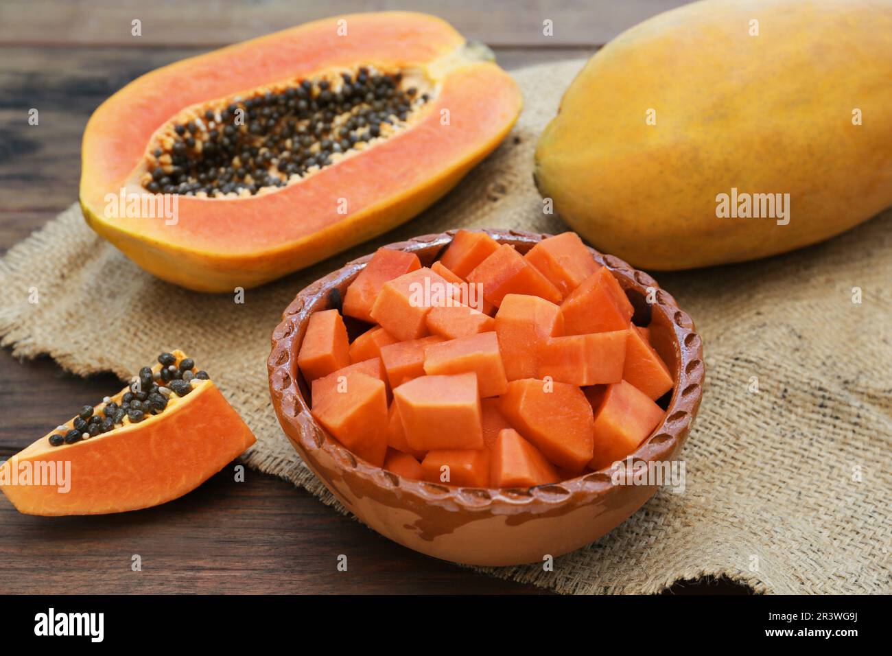 Half cut whole papaya hi-res stock photography and images - Alamy