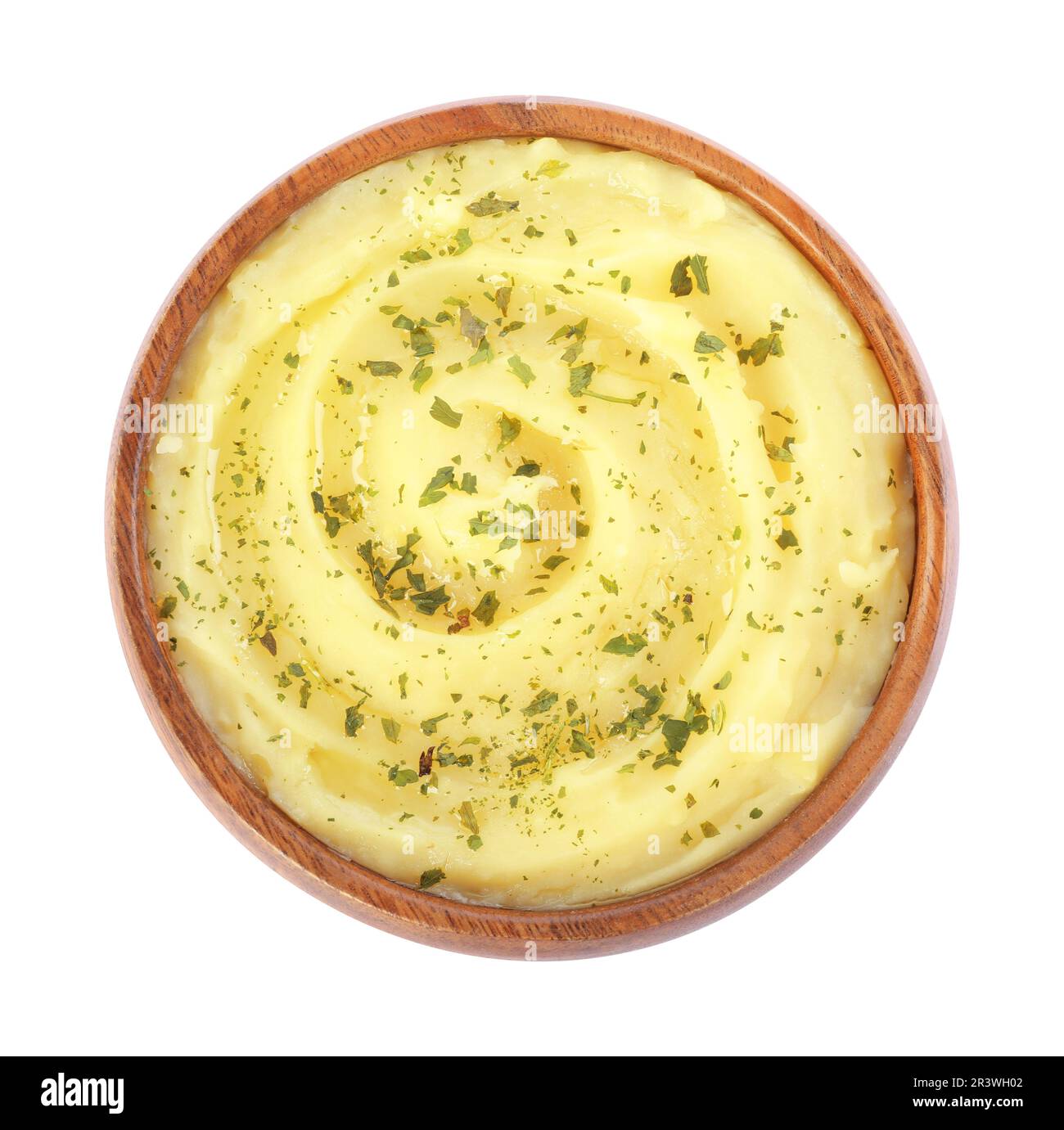 Bowl of tasty mashed potato with greens isolated on white, top view ...