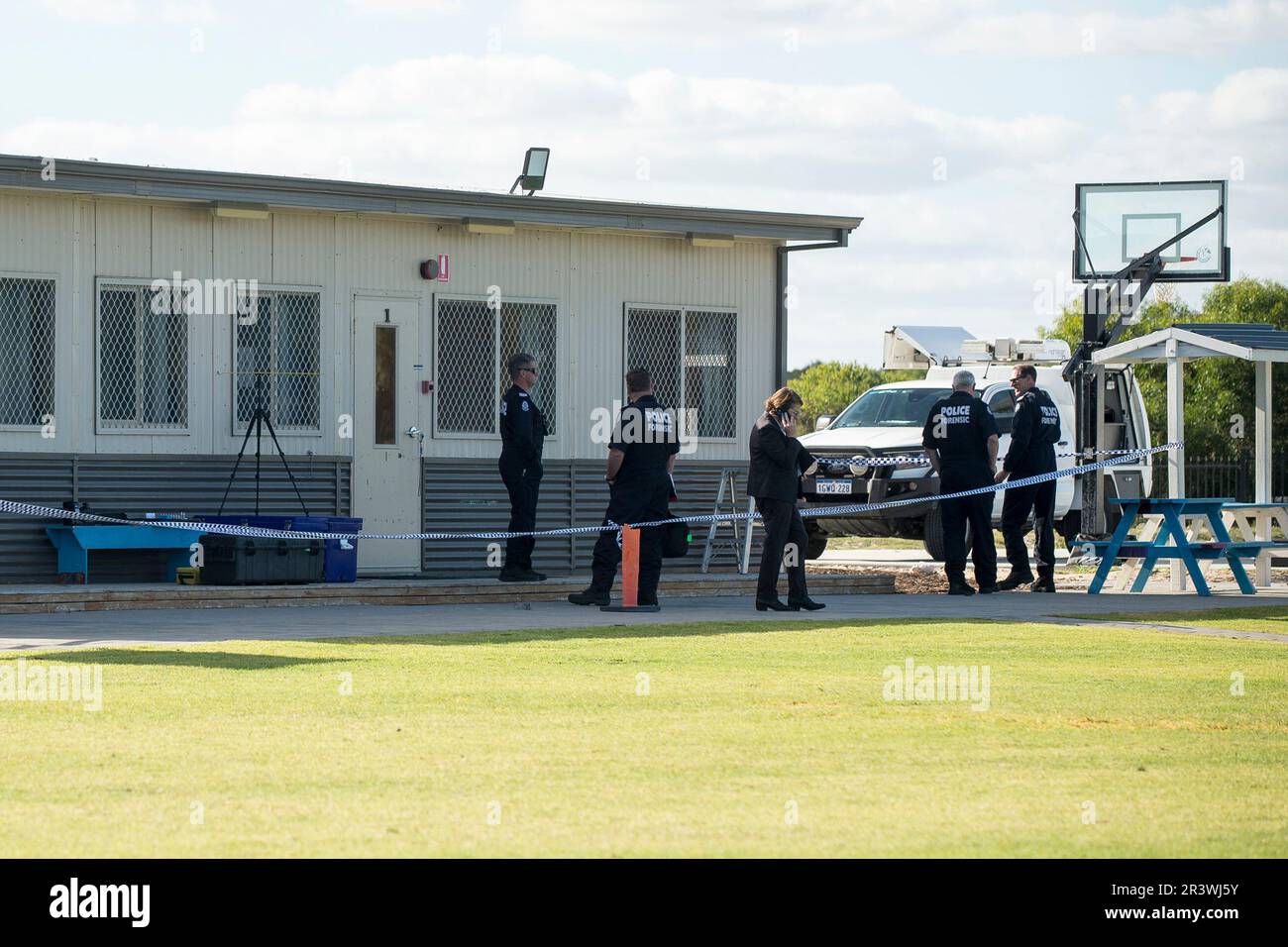 Perth, Australia. 25th May, 2023. Police inspect a classroom that was ...