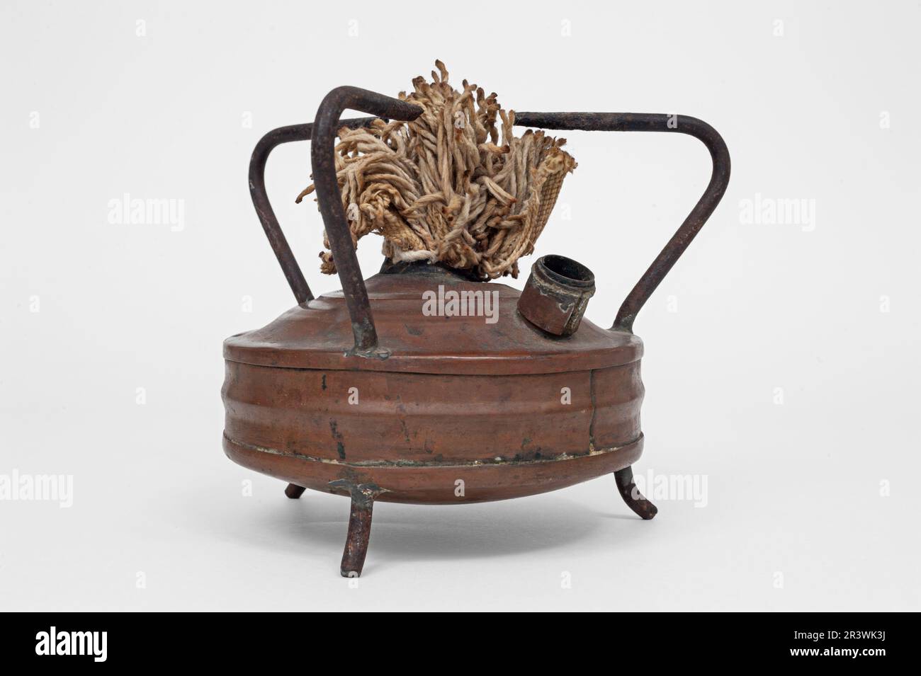 Ancient brass and copper oil lamp with wick Stock Photo - Alamy