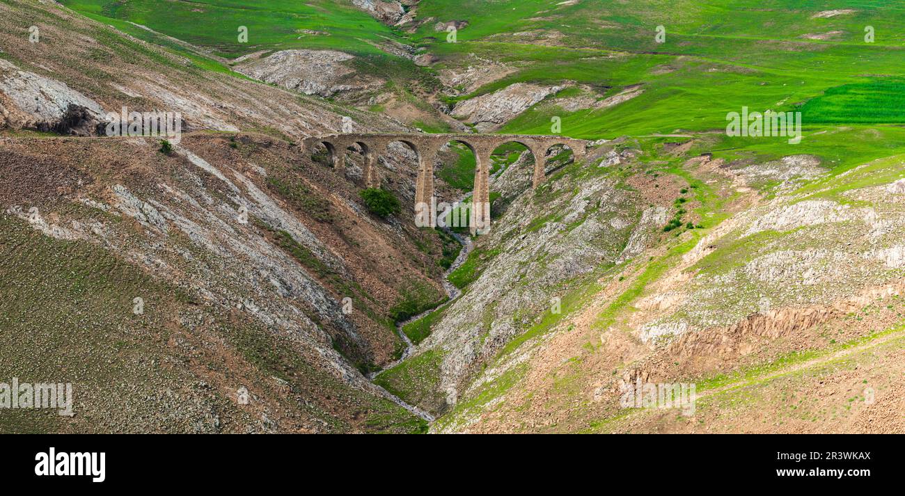 An ancient stone bridge in the suburbs of the city of Gadabay, built by ...