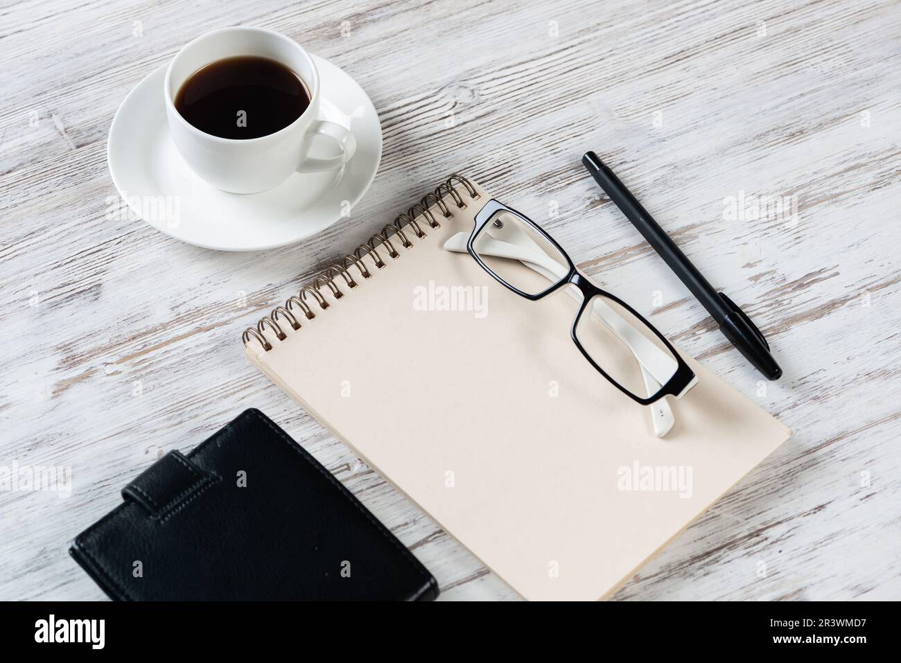 Top view office desk with white cup of coffee Stock Photo - Alamy