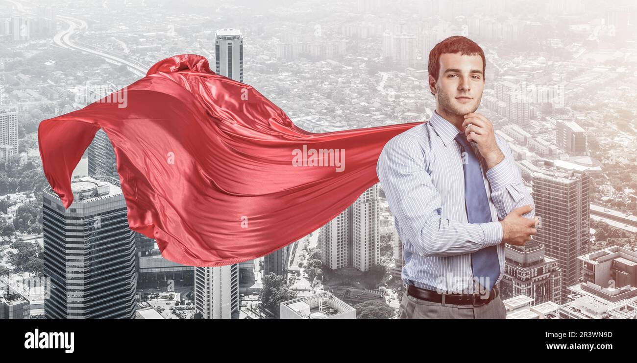 Concept of power and sucess with businessman superhero in big city ...