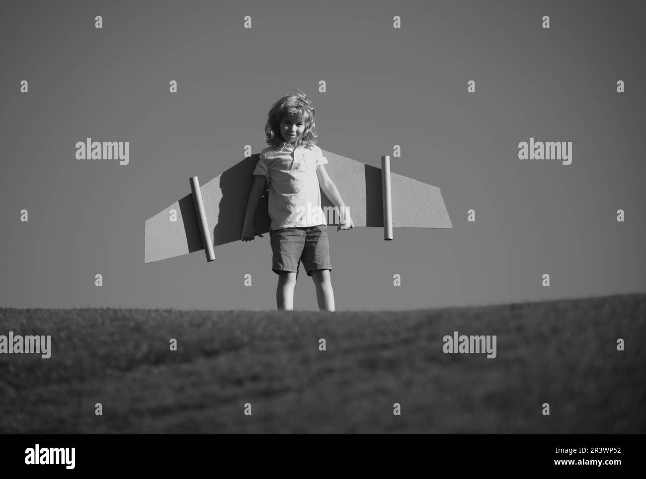 Child boy playing pilot on the sky blue background. Kid dreaming. Child ...