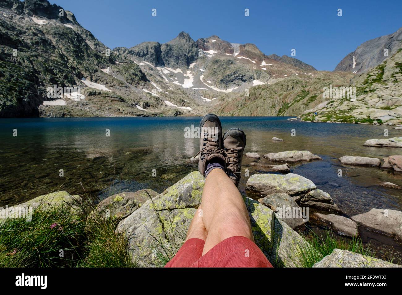 Feet in boots relaxing Stock Photo - Alamy