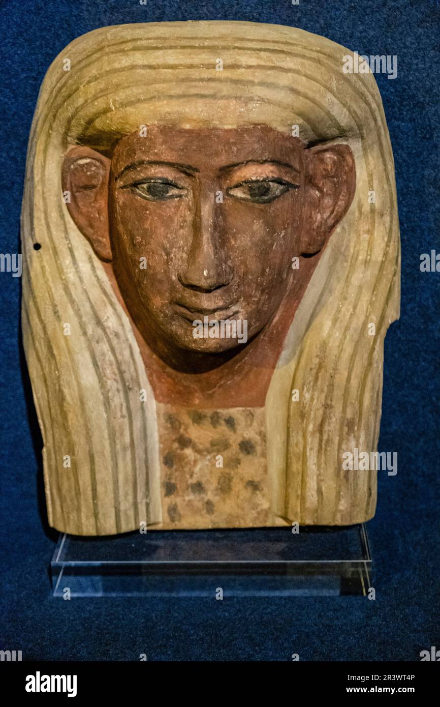Egyptian anthropomorphic coffin face Stock Photo - Alamy