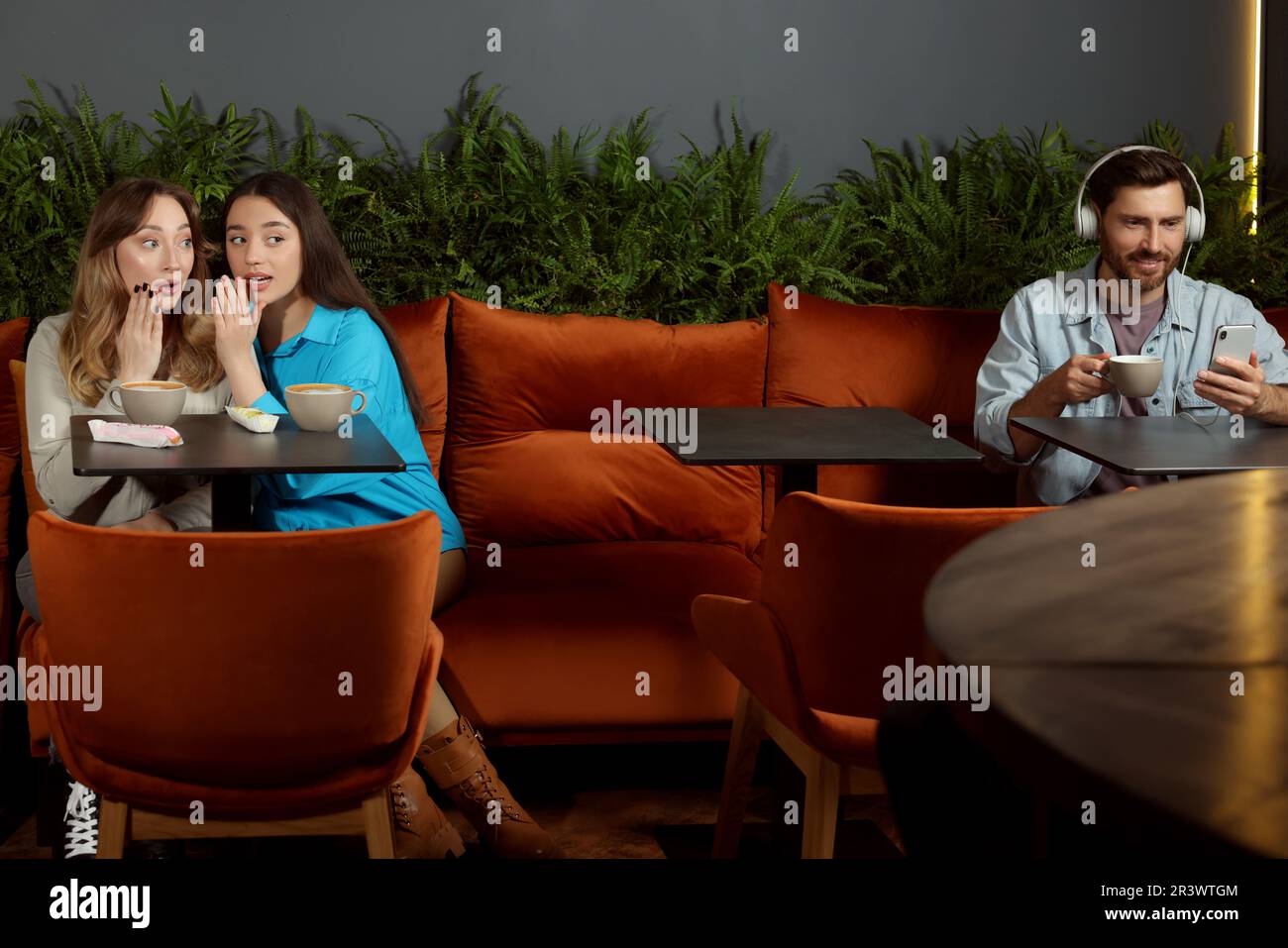 People with coffee spending time in cafe Stock Photo - Alamy