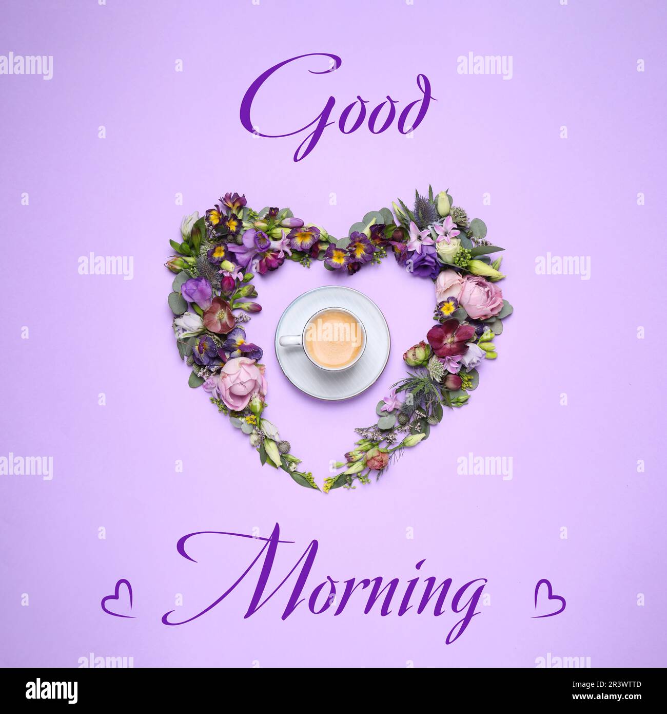 Good morning! Beautiful heart made of different flowers and coffee on ...