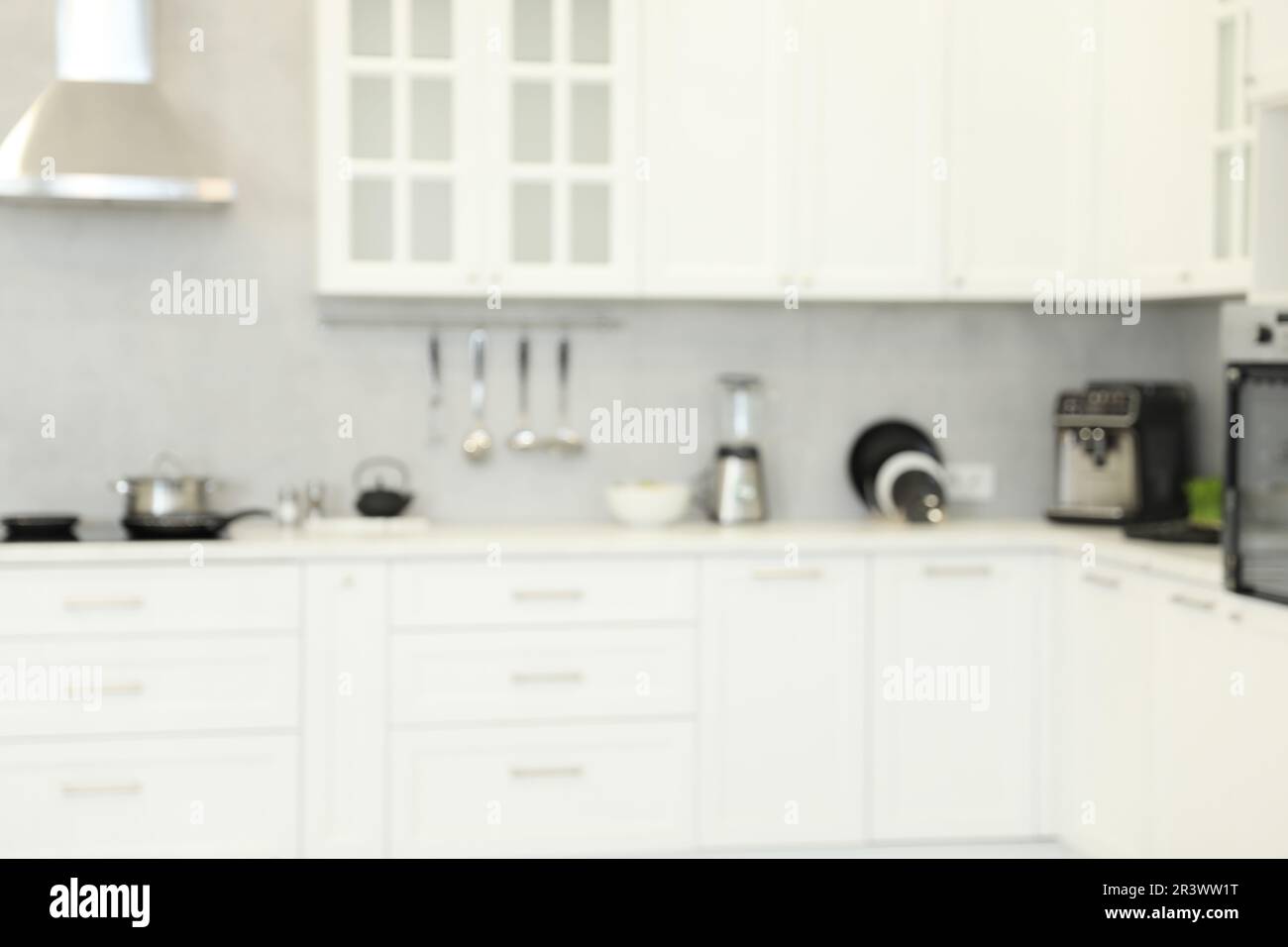 Blurred view of modern kitchen. Interior design Stock Photo - Alamy