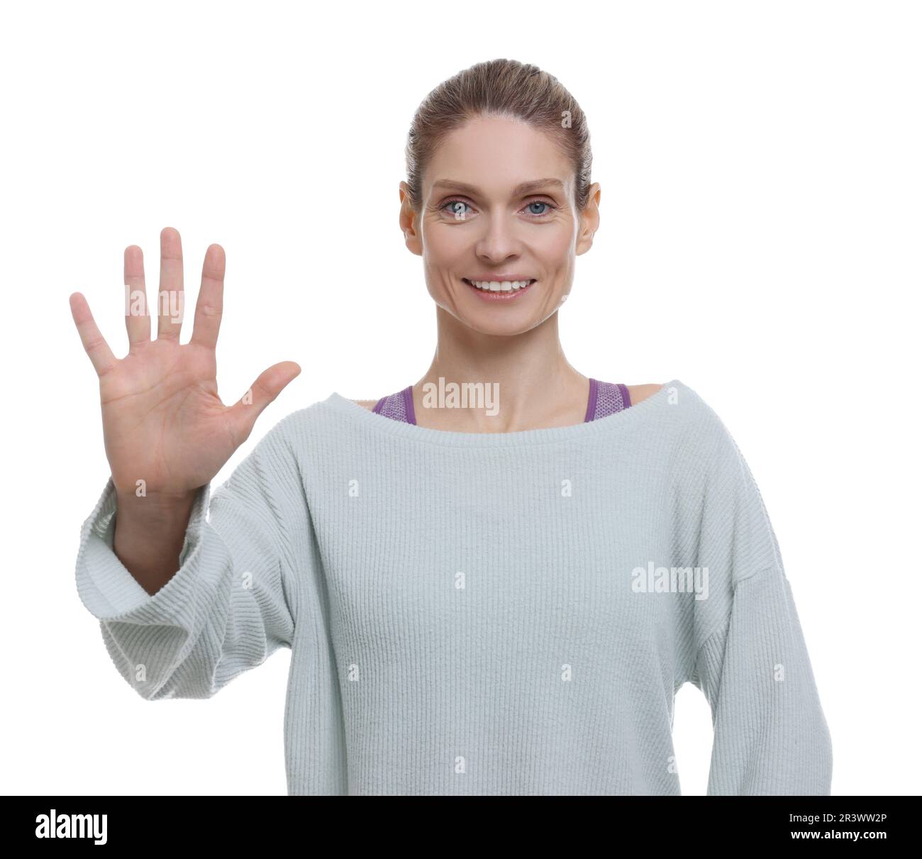 Woman giving high five on white background Stock Photo - Alamy