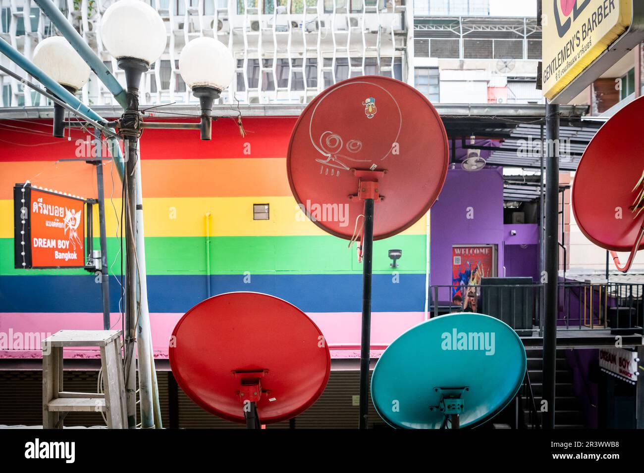 TV & internet satellite dishes stand on the upper level of the small ...