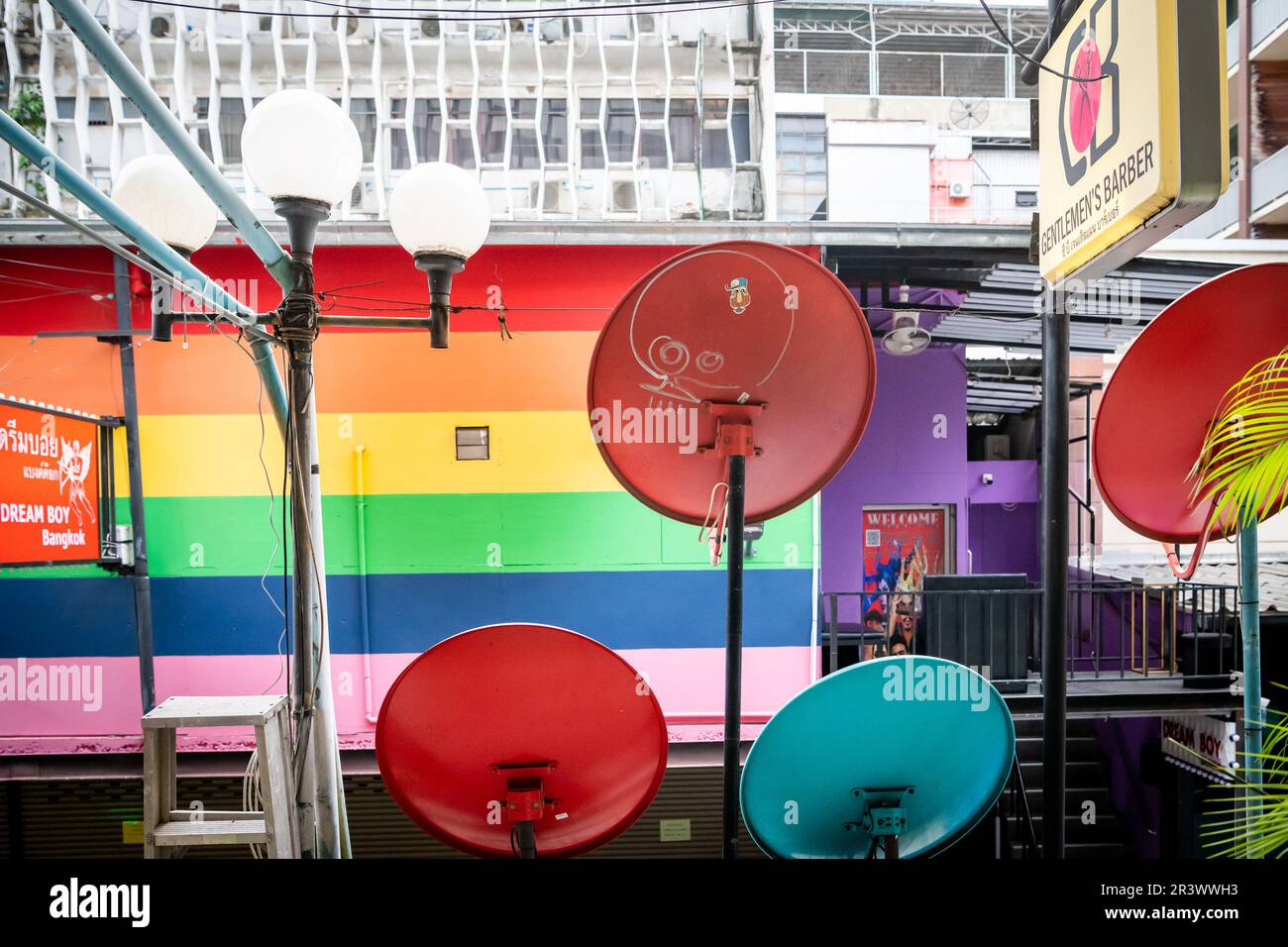 TV & internet satellite dishes stand on the upper level of the small ...