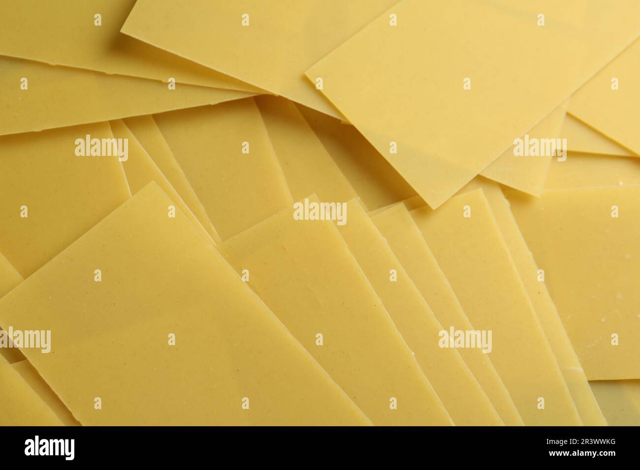 Pile of dry lasagna sheets as background, closeup Stock Photo - Alamy