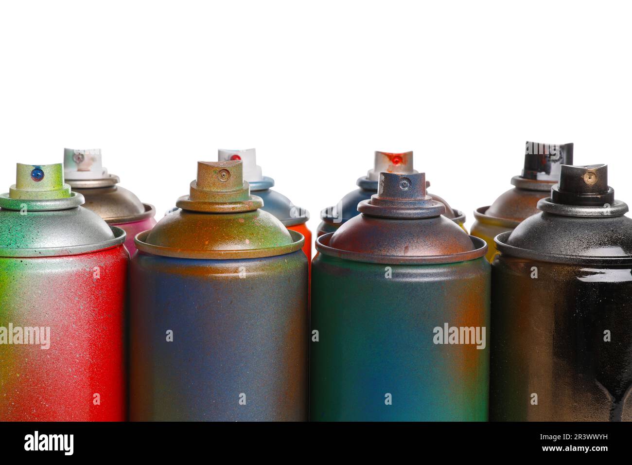 Used cans of spray paints on white background Stock Photo - Alamy