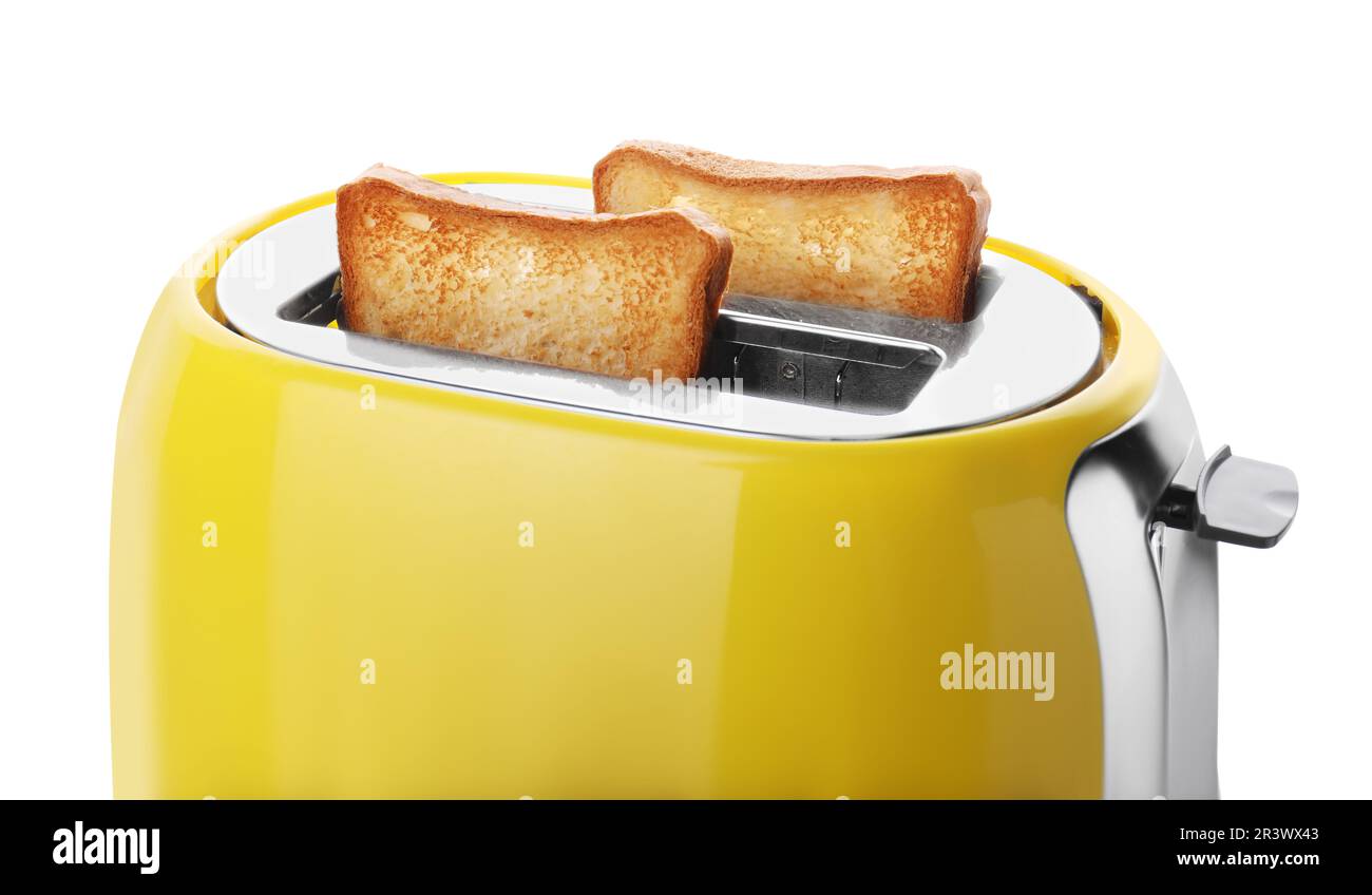 Yellow toaster with roasted bread slices on white background Stock ...