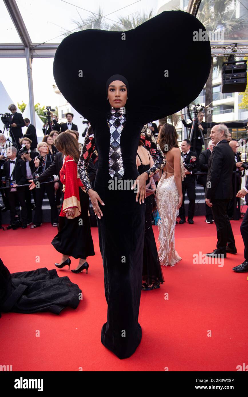 Ikram Abdi poses for photographers upon arrival at the premiere of the film 'The Pot-au-Feu' at ...
