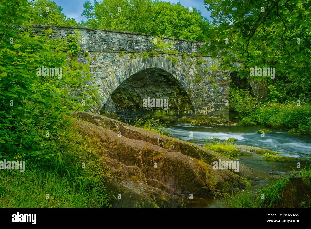 The River Brathay flowing under Skelwith Bridge Stock Photo - Alamy
