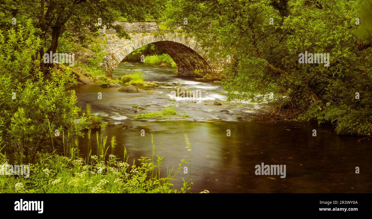 The River Brathay flowing under Skelwith Bridge Stock Photo - Alamy