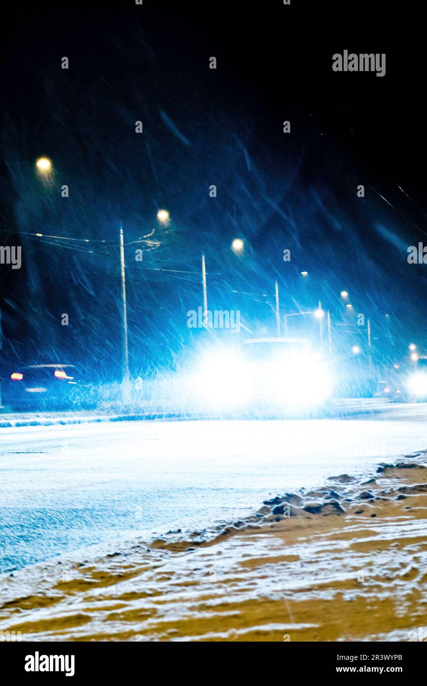 cars at night in a stormy snow weather Stock Photo - Alamy