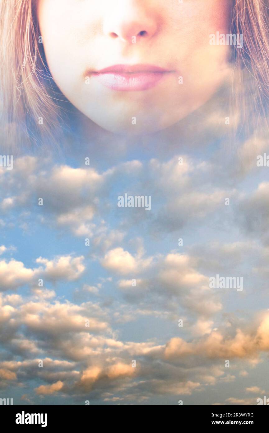sky with clouds and half face of a Caucasian girl in the upper part ...