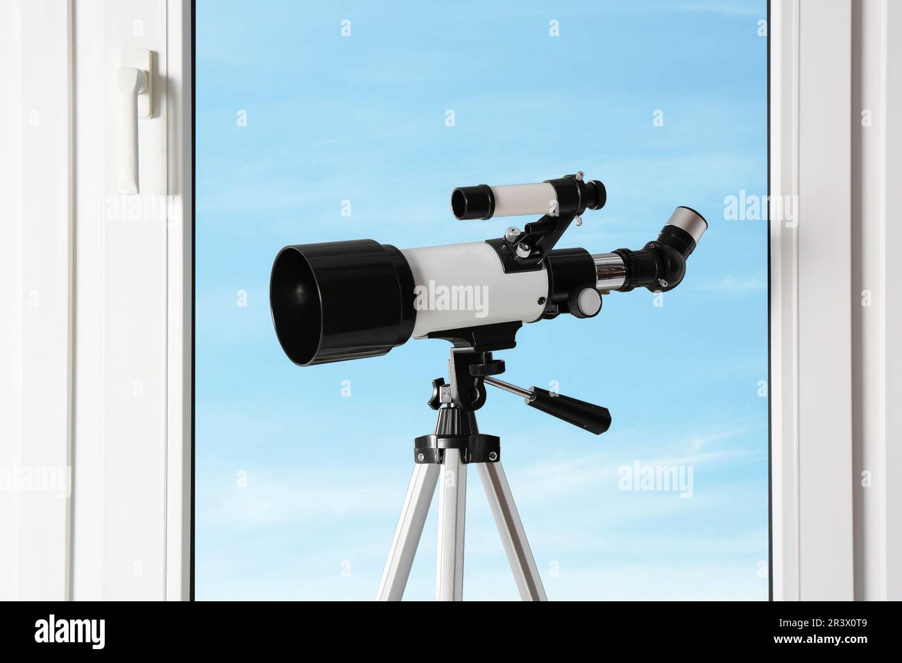Telescope by window hi-res stock photography and images - Alamy