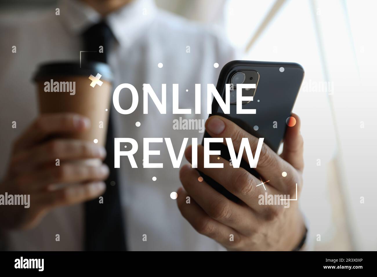 Online review. Man using mobile phone to leave feedback, closeup Stock Photo - Alamy