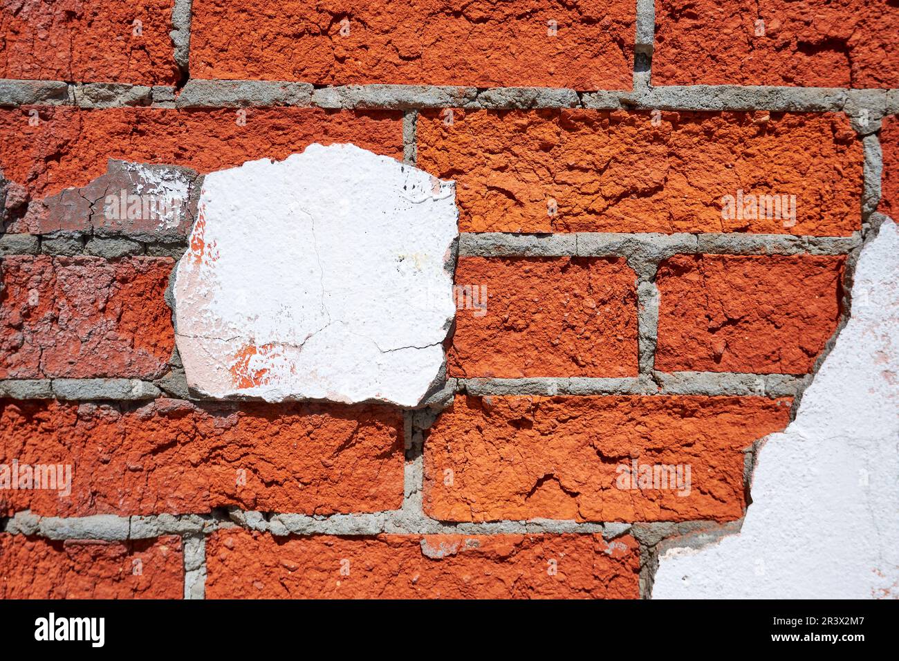 Brick wall with pieces of old peeling off white plaster Stock Photo - Alamy